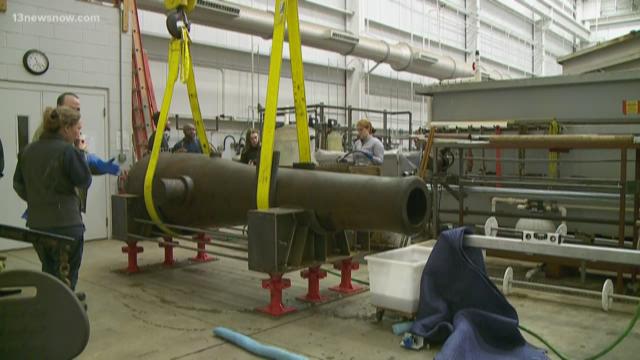 Conservators clean Civil War ironclad USS Monitor's guns | 13newsnow.com